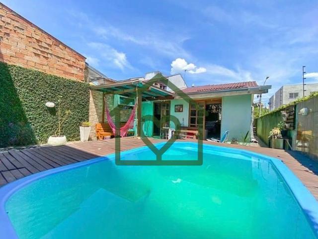 Casa para venda em Jardim Algarve em Alvorada Rio Grande do Sul de 175.00m² com 2 Quartos e 2 Garagens
