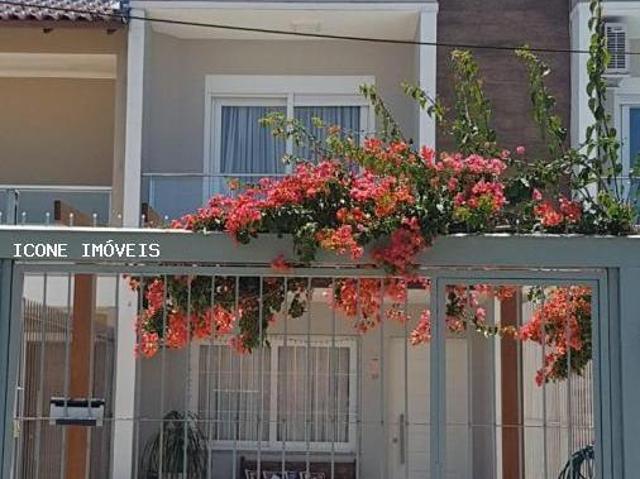 Casa para Venda em Porto Alegre, Guarujá, 2 dormitórios, 2 suítes, 3 banheiros, 2 vagas