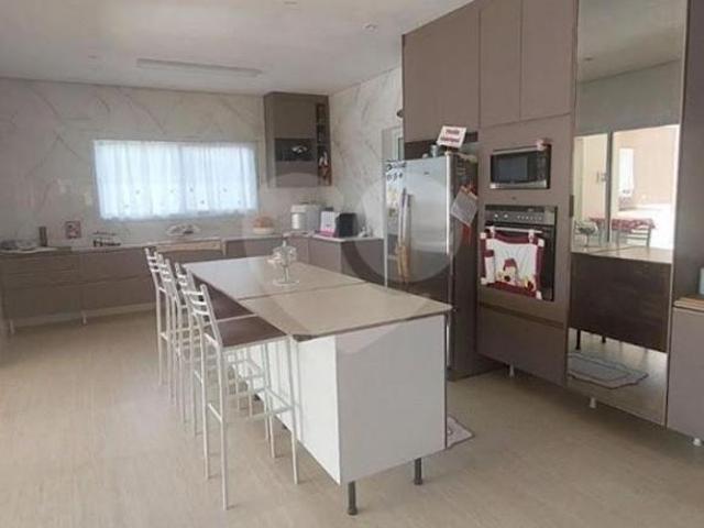 Casa para venda em Parque Dos Resedás de 353.00m² com 4 Quartos, 4 Suites e 6 Garagens