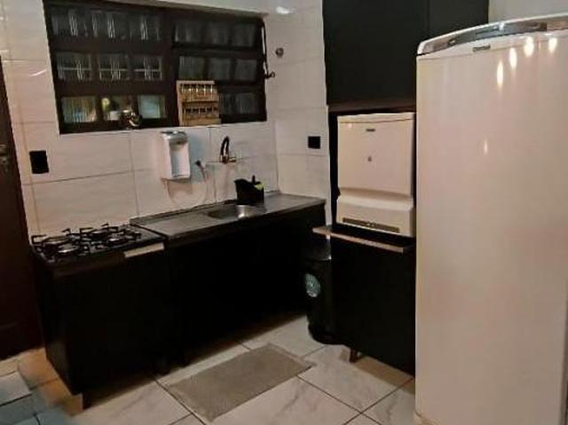 Casa para Venda em Praia Grande, Maracanã, 2 dormitórios, 2 suítes, 1 banheiro, 2 vagas