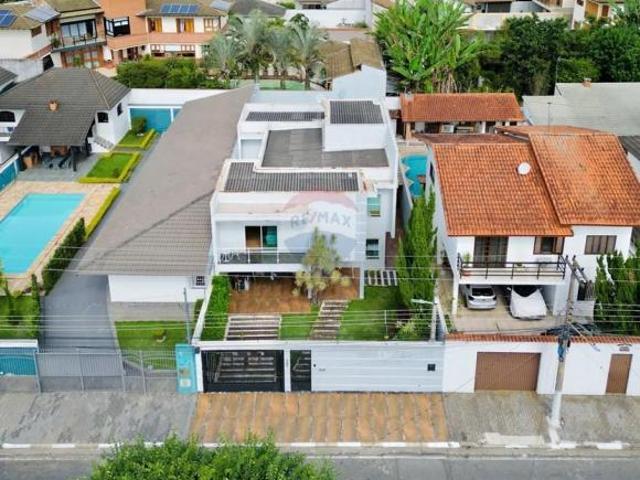 Casa para venda em Vila Romanópolis de 248.40m² com 4 Quartos, 2 Suites e 3 Garagens