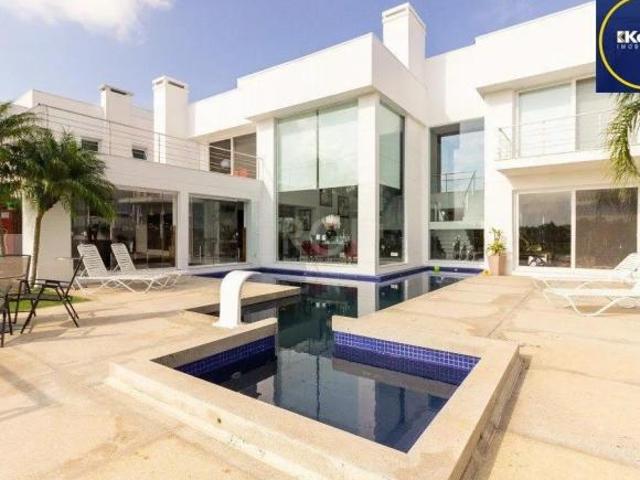 Casa para venda no condomínio Terra Ville com 3 dormitórios, sendo 3 suites e 4