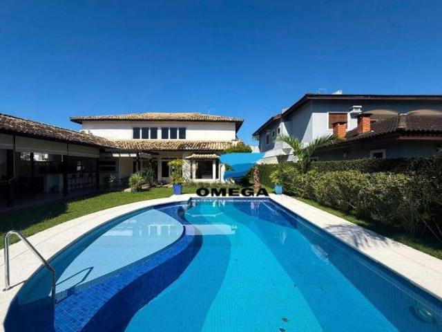 Casa Reformada á venda no Jardim Acapulco no Guarujá I Omega Imoveis