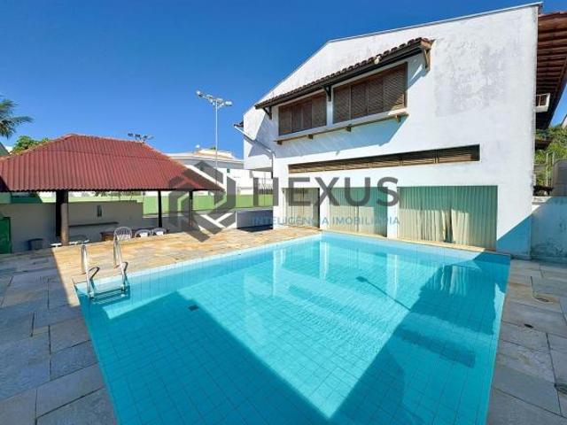 Casa reformada com piscina e área gourmet no Jardim Acapulco, Guarujá