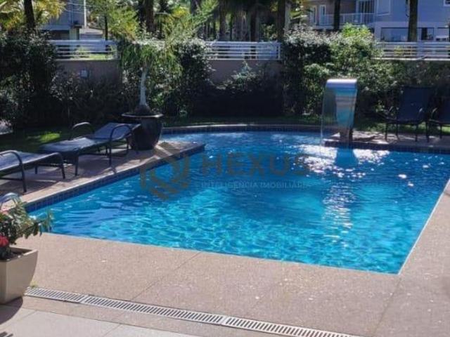 Casa reformada com piscina e área gourmet no Jardim Pernambuco I, Guaruja