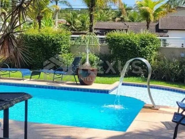 Casa reformada com piscina e área gourmet no Jardim Pernambuco I, Guaruja