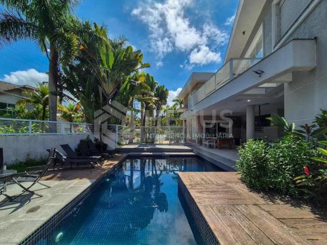 Casa reformada com piscina e área gourmet no Jardim Pernambuco I, Guarujá
