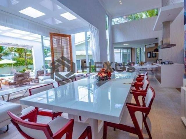Casa reformada com varanda gourmet e piscina no Jardim Pernambuco I, Guarujá