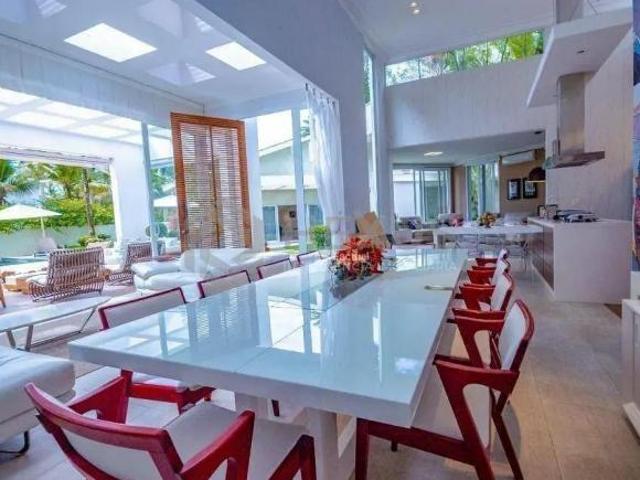 Casa reformada com varanda gourmet e piscina no Jardim Pernambuco I, Guarujá