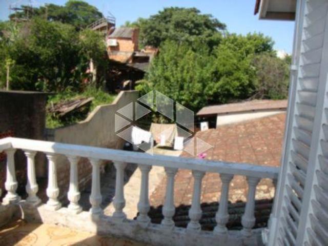Casa Residencial na zona alta da Rua Barão de Bagé