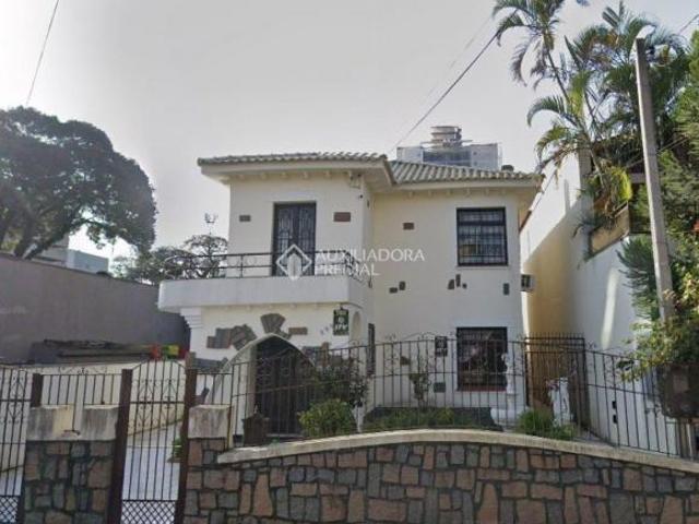 CASA RESIDENCIAL OU COMERCIAL COM 310M2, NA MELHOR RUA DO BAIRRO MENINO DEUS