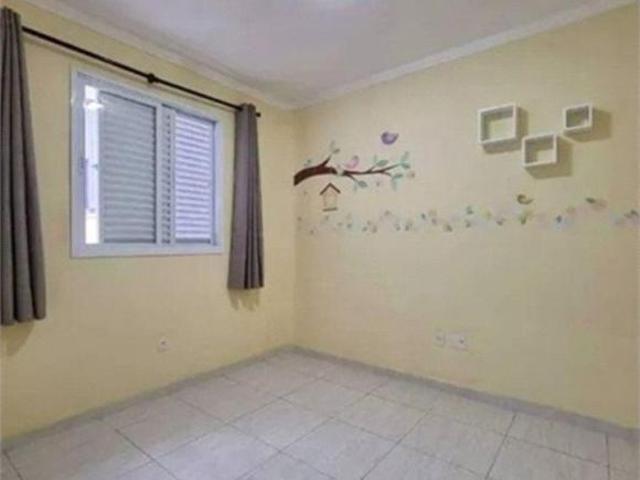 Casa com 2 dormitórios à venda, 100 m² por R$ 650.000,00 José Menino Santos/SP
