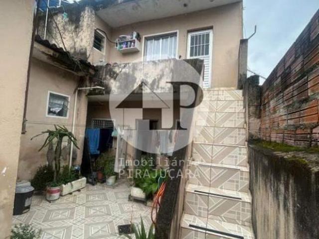 Casa residencial à venda no Taboão da Serra Frente | 4 quartos, 3 varandas e quintal