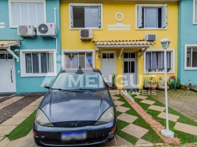 Casa residencial com 2 dormitórios e 1 vaga em condomínio no Bairro Sarandi em Porto Alegre com 66m²