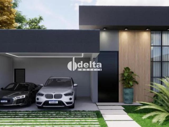 Casa residencial com 3 suítes disponível para venda no bairro Grand Ville em Uberlândia MG