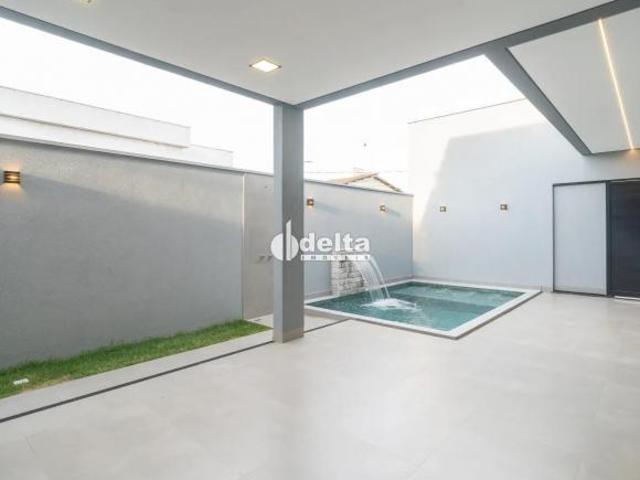 Casa residencial com 3 suítes disponível para venda no bairro Laranjeiras em Uberlândia MG