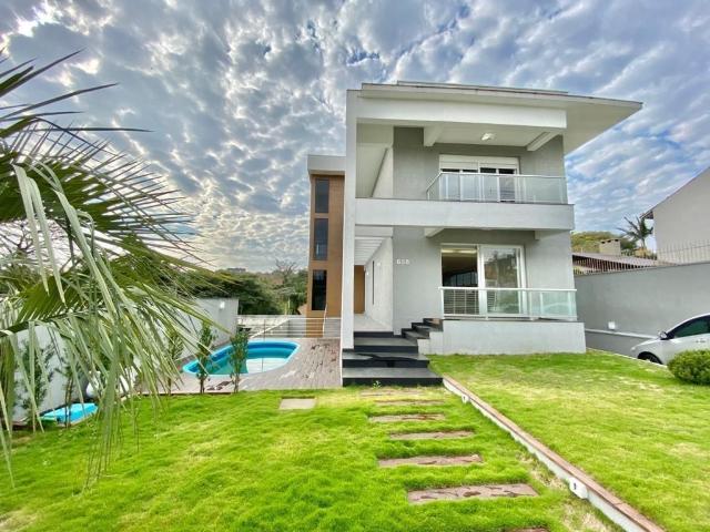 Casa Residencial com Piscina e 4 Quartos no Guarujá – Zona Sul de Porto Alegre