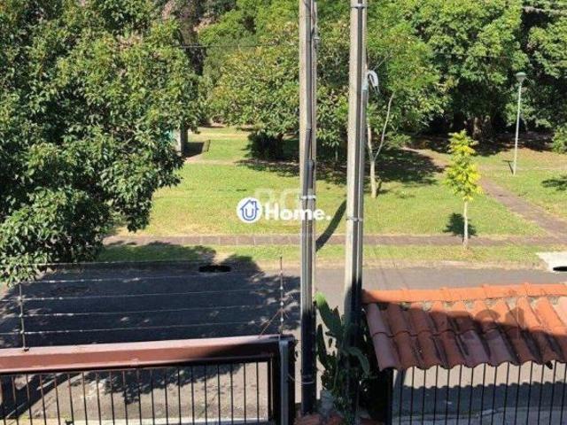Casa residencial de 3 dormitórios sendo um uma suíte localizada no bairro Guaruj