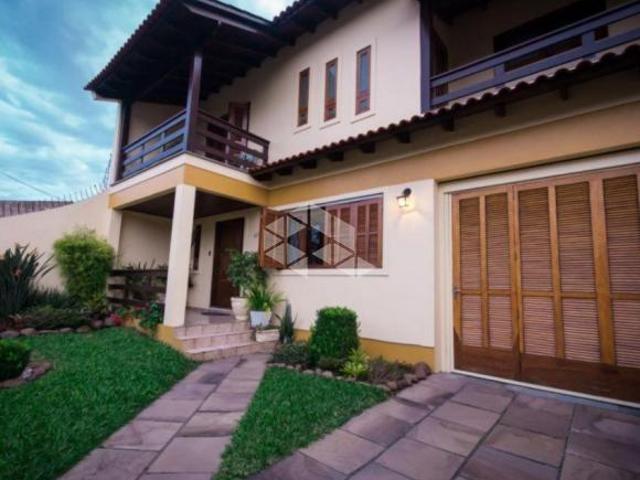 Casa Residencial de 4 Dormitórios no bairro Cavalhada, Porto Alegre