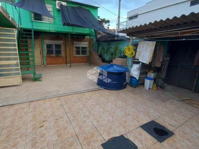 casa residencial e comercial a venda, pátio, av Assis Brasil, loja