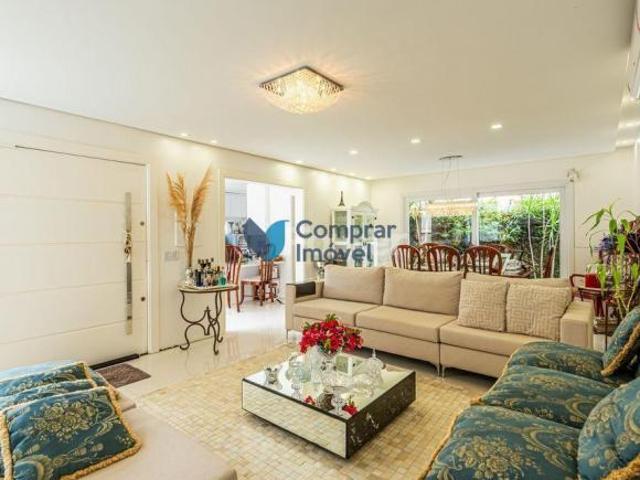 Casa Residencial e Prédio Comercial na frente no bairro Tristeza