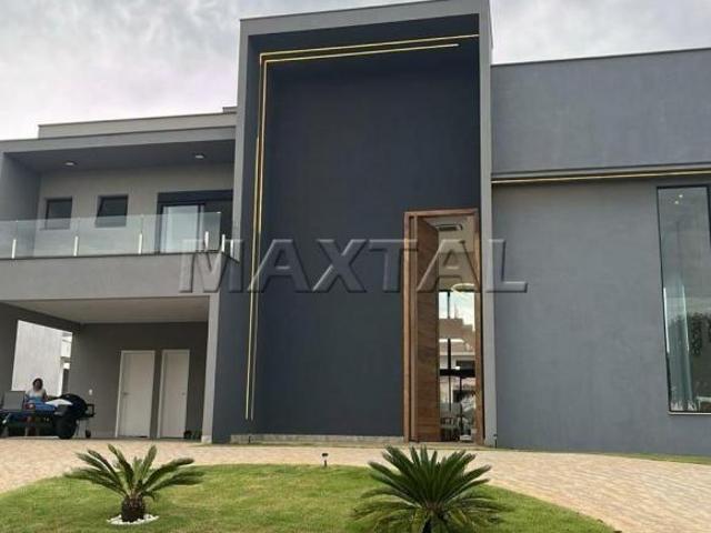 Casa residencial em condominio de luxo em Porto Feliz, com 4 suítes, sala ampla e 5 vagas