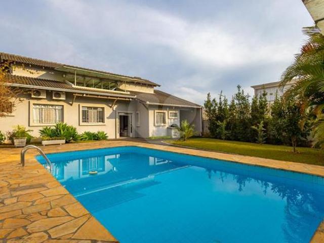 CASA RESIDENCIAL EM SANTA FELICIDADE COM 4 QUARTOS 1 SUÍTE 3 BANHEIROS E 6 VAGAS