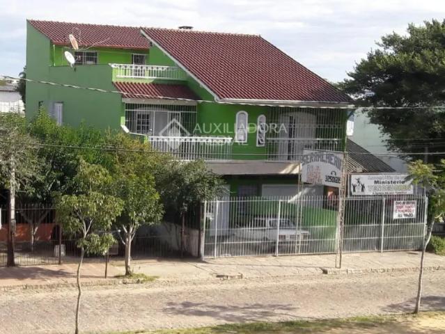 Casa residencial à venda no bairro Restinga com 4 dormitórios/quartos e 406 m²