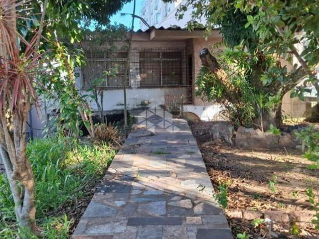 Casa residencial/Comercial na Avenida Otto Niemeyer com amplo terreno bairro Tristeza Porto Alegre
