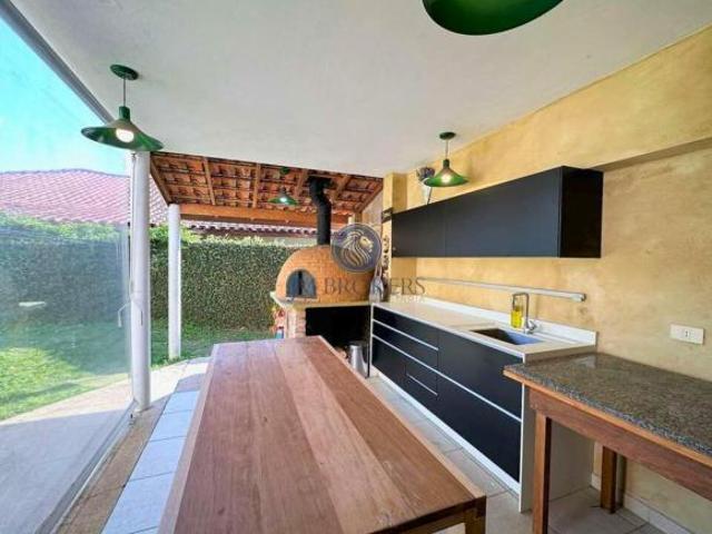 Casa semitérrea de alto padrão à venda no condomínio Jardim Passárgada A, Granja Viana, 3 suítes, 3