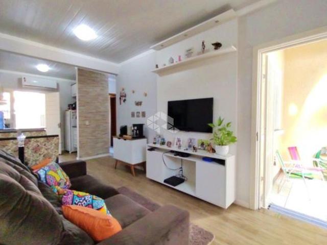 Casa semi mobiliada em condomínio com 02 dormitórios e 02 vagas cobertas
