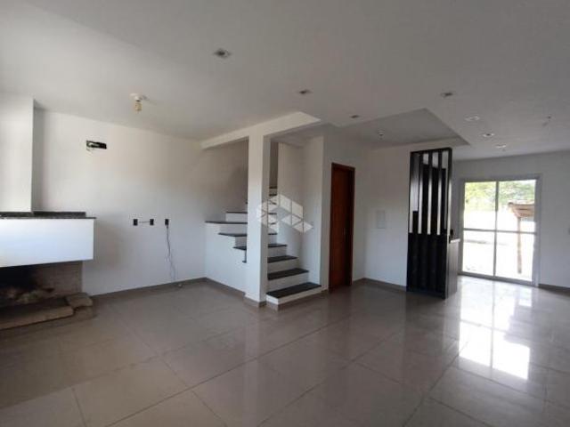 CASA SEMIMOBILIADA COM 3 DORMITÓRIOS 1 SUITE COM SACADA, LAREIRA, CHURRASQUEIRA PÁTIO COM 1 VAGA DES