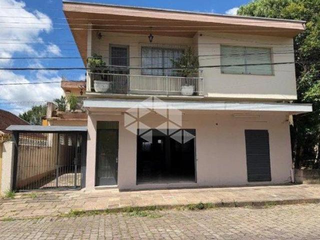 Casa semimobiliada à venda no bairro Exposição, Caxias do Sul/RS