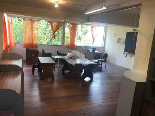 Casa Sobrado, 4 dormitórios, 2 suítes, 4 vagas e elevador no bairro Boa Vista