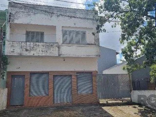 Casa /Sobrado com apartamento e loja, estacionamento, a venda no Bairro Jardim