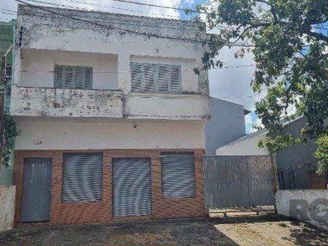 Casa /Sobrado com apartamento e loja, estacionamento, a venda no Bairro Jardim Itu. Lojão embaixo co