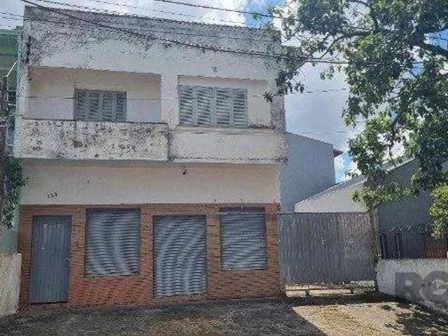 Casa /Sobrado com apartamento e loja, estacionamento, a venda no Bairro Jardim Itu. Lojão embaixo co