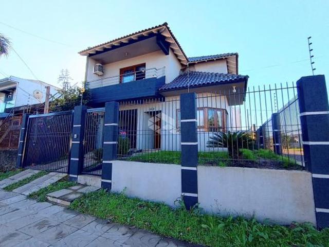 Casa Sobrado com piscina à venda em Igara, Canoas
