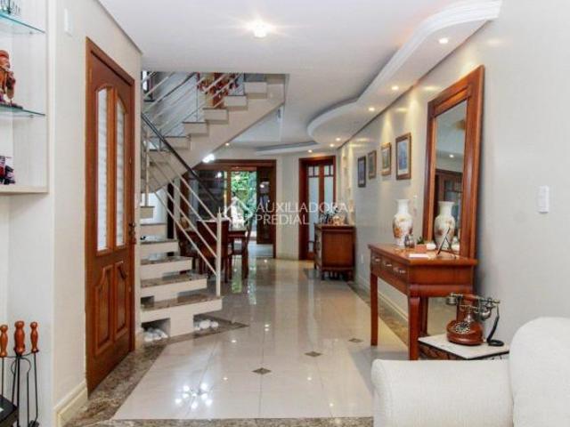 CASA/ SOBRADO COM PISCINA DENTRO DO CONDOMÍNIO RESERVA DO TAIM EM PORTO ALEGRE RS