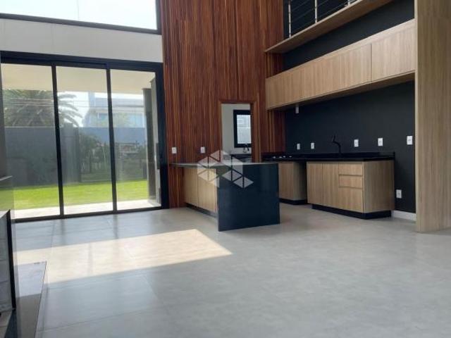 Casa sobrado com 4 suítes no Condomínio SEA COAST XANGRI LÁ/RS