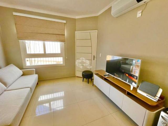 Casa sobrado em Condomínio, 3 dormitórios, sendo 2 suítes, sacada, churrasqueira