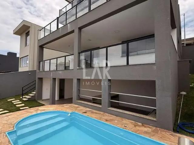 Casa / Sobrado em Condomínio para Locação em Vespasiano/MG Alphaville 4 Quartos