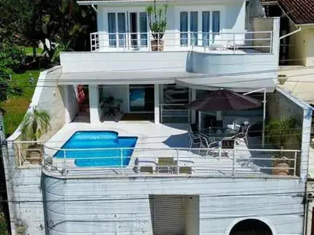 Casa / Sobrado em Condomínio para Locação em Caraguatatuba/SP Praia da Cocanha 6 Quartos