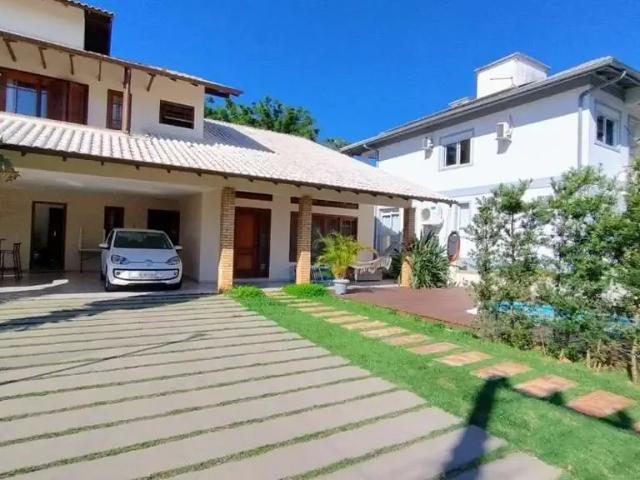 Casa / Sobrado em Condomínio para Locação em Florianópolis/SC Rio Tavares 4 Quartos