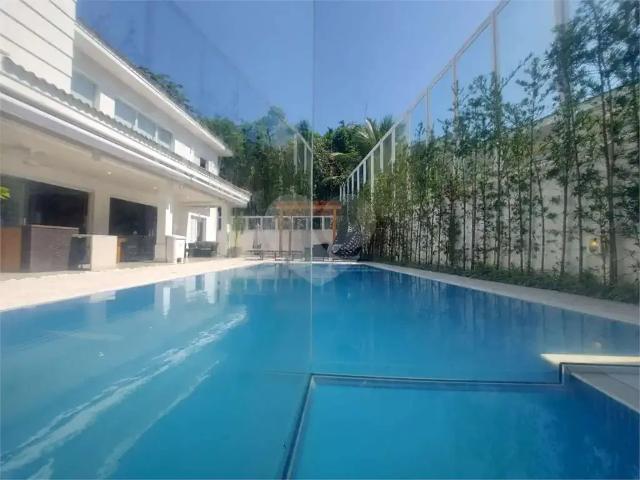 Casa / Sobrado em Condomínio para Locação em Guarujá/SP Balneário Praia do Pernambuco 4 Quartos