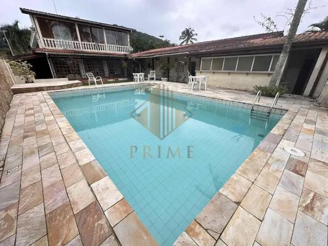 Casa / Sobrado em Condomínio para Locação em Guarujá/SP Balneario Praia do Perequê 5 Quartos