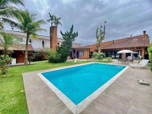 Casa / Sobrado em Condomínio para Locação em Guarujá/SP Jardim Acapulco 4 Quartos
