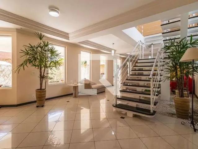 Casa / Sobrado em Condomínio para Locação em Santana de Parnaíba/SP Alphaville 4 Quartos