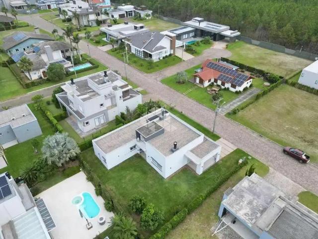 Casa / Sobrado em Condomínio para Venda em Osório/RS Condomínio Lagoa do Passo 4 Quartos