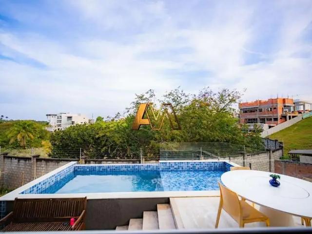 Casa / Sobrado em Condomínio para Venda em Camaçari/BA Alphaville Abrantes 5 Quartos